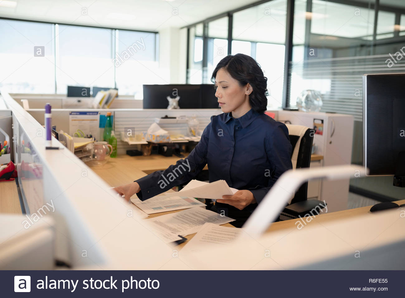 Mature woman sorting office hi-res stock photography and images - Alamy