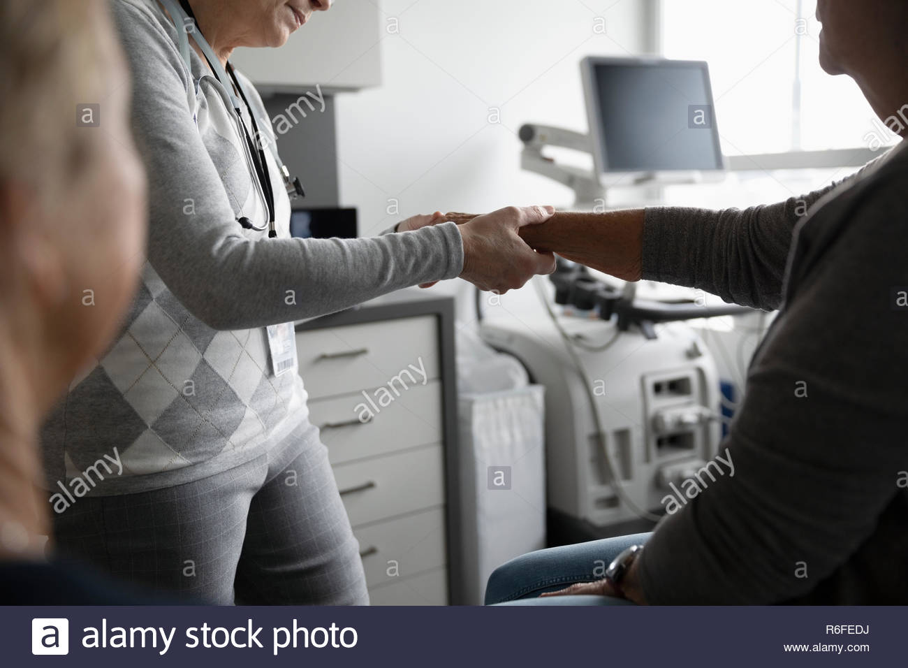 Female patient holding hand hi-res stock photography and images - Alamy