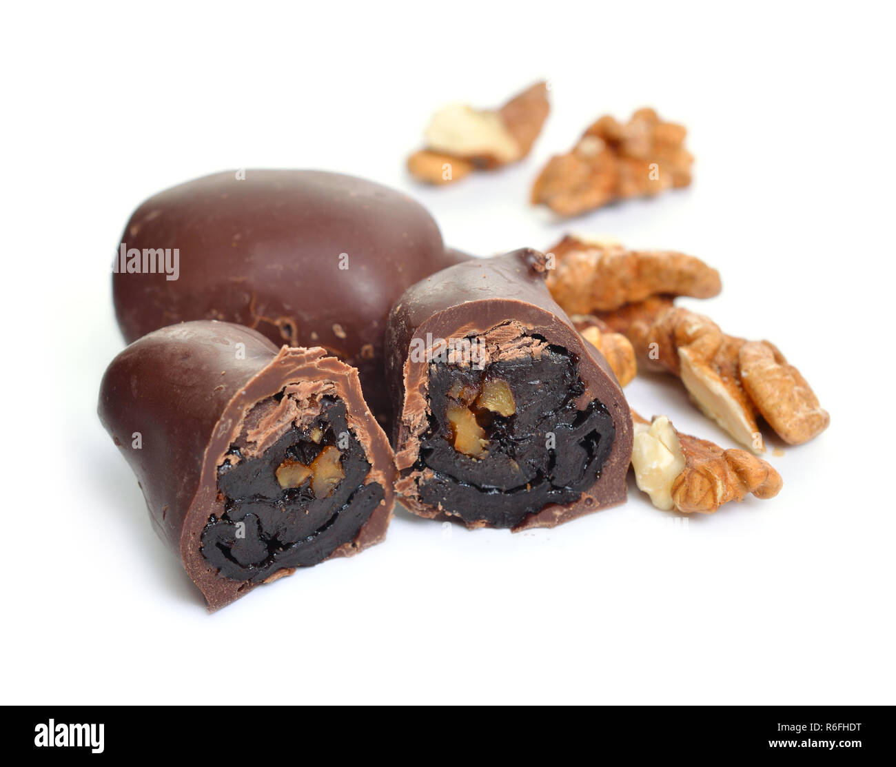 Homemade Candies with dried plum and nuts. Isolated on white background ...