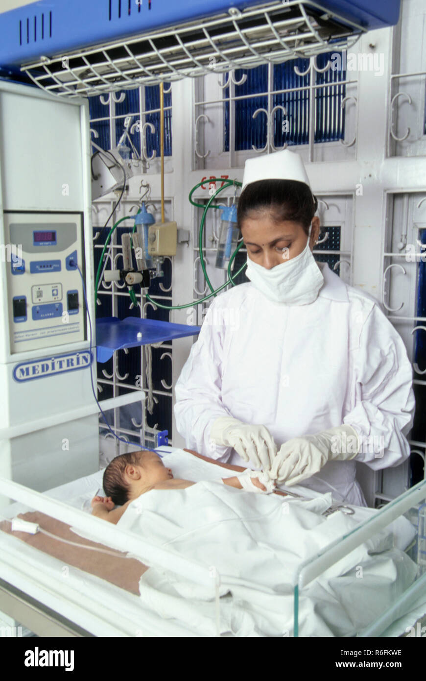 Lady doctor baby checking clinic hi-res stock photography and images ...