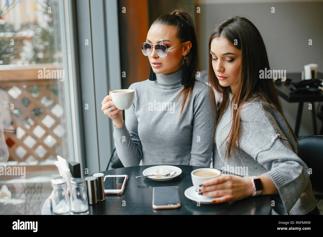 girls in a cafe Stock Photo - Alamy
