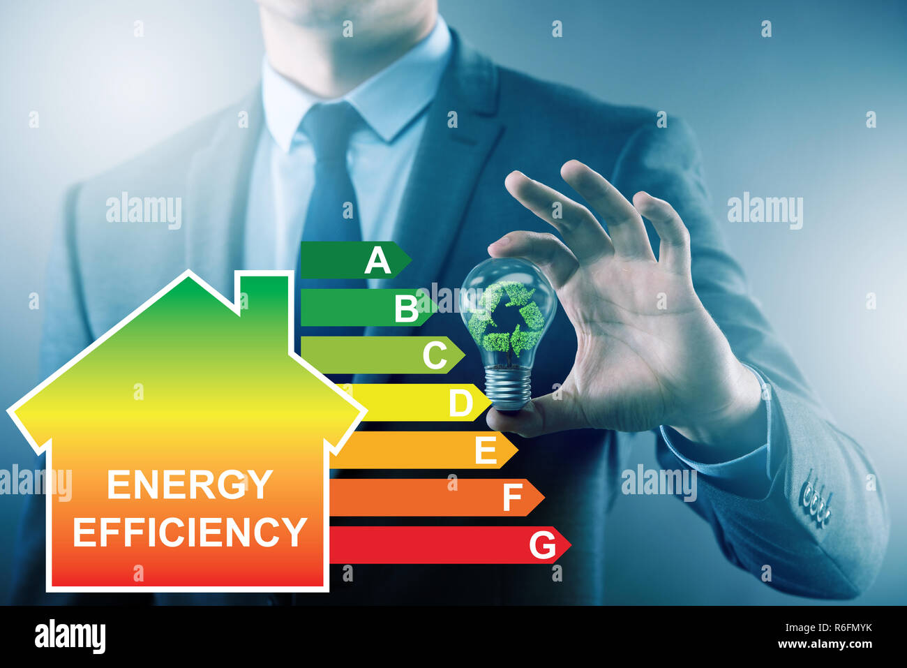 Businessman in energy efficiency concept Stock Photo - Alamy