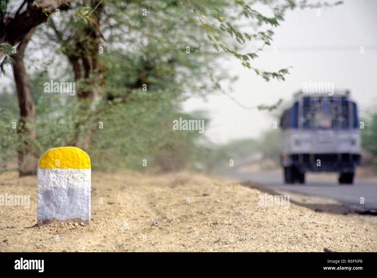 milestone on road Stock Photo - Alamy