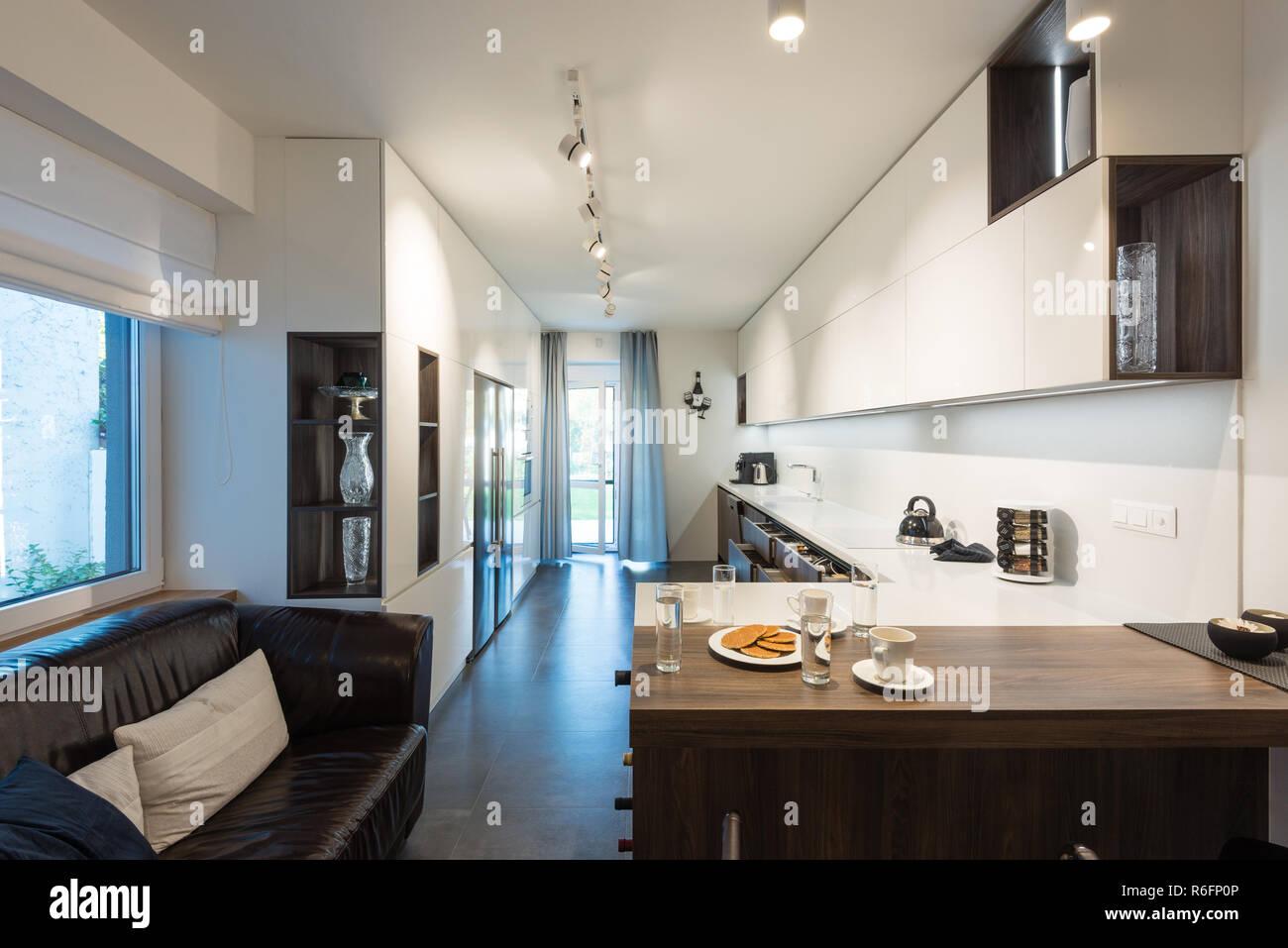Interior of modern kitchen with built-in appliances Stock Photo - Alamy