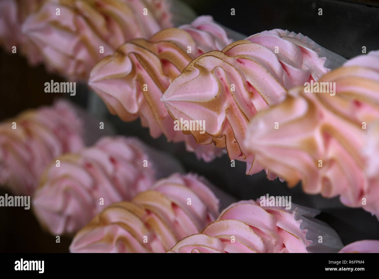 meringue in the shop window of a pastry shop Stock Photo - Alamy