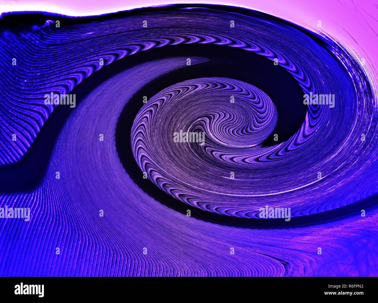 Twirled coloured mosaic feather Stock Photo - Alamy