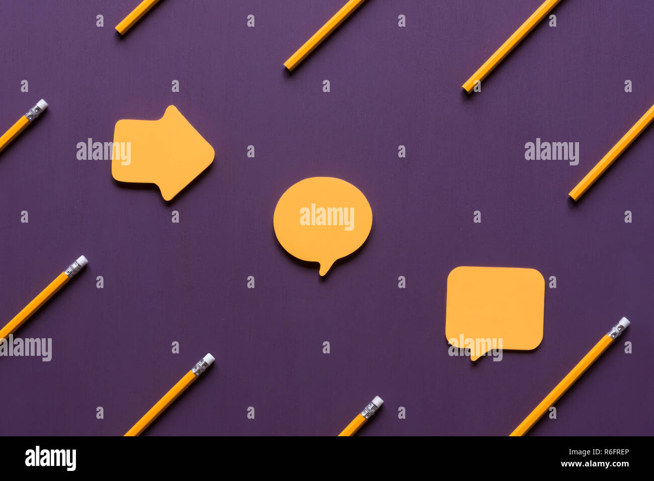 Diverse shaped sticky notes and pencils Stock Photo - Alamy