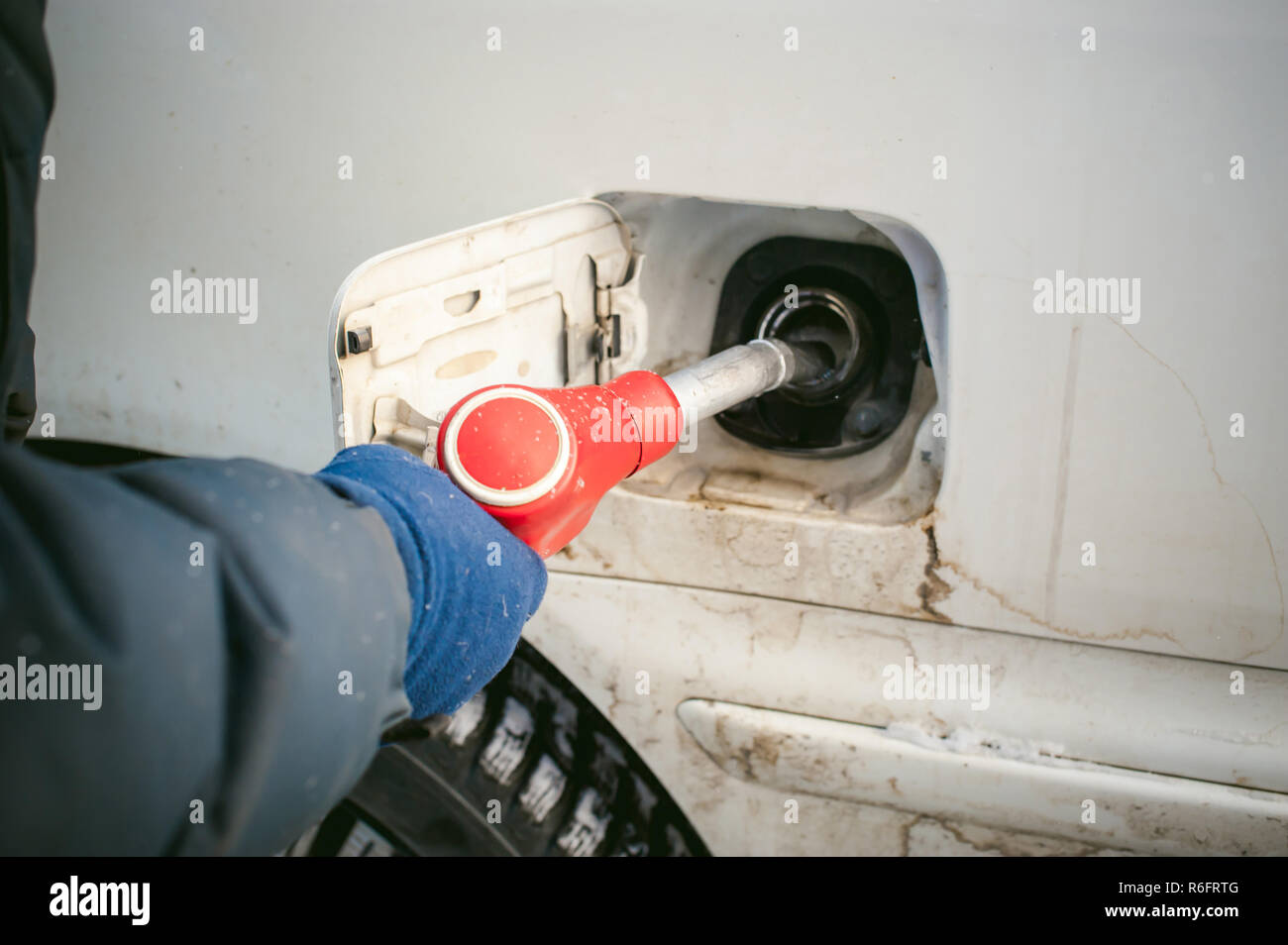 refueling nozzle is inserted in the tank car at a gas station Stock ...