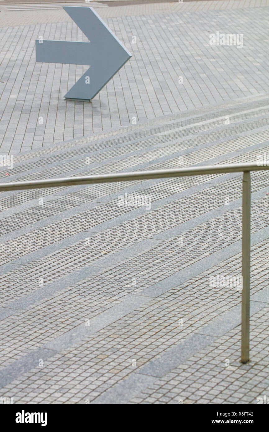 Concrete direction arrow hi-res stock photography and images - Alamy