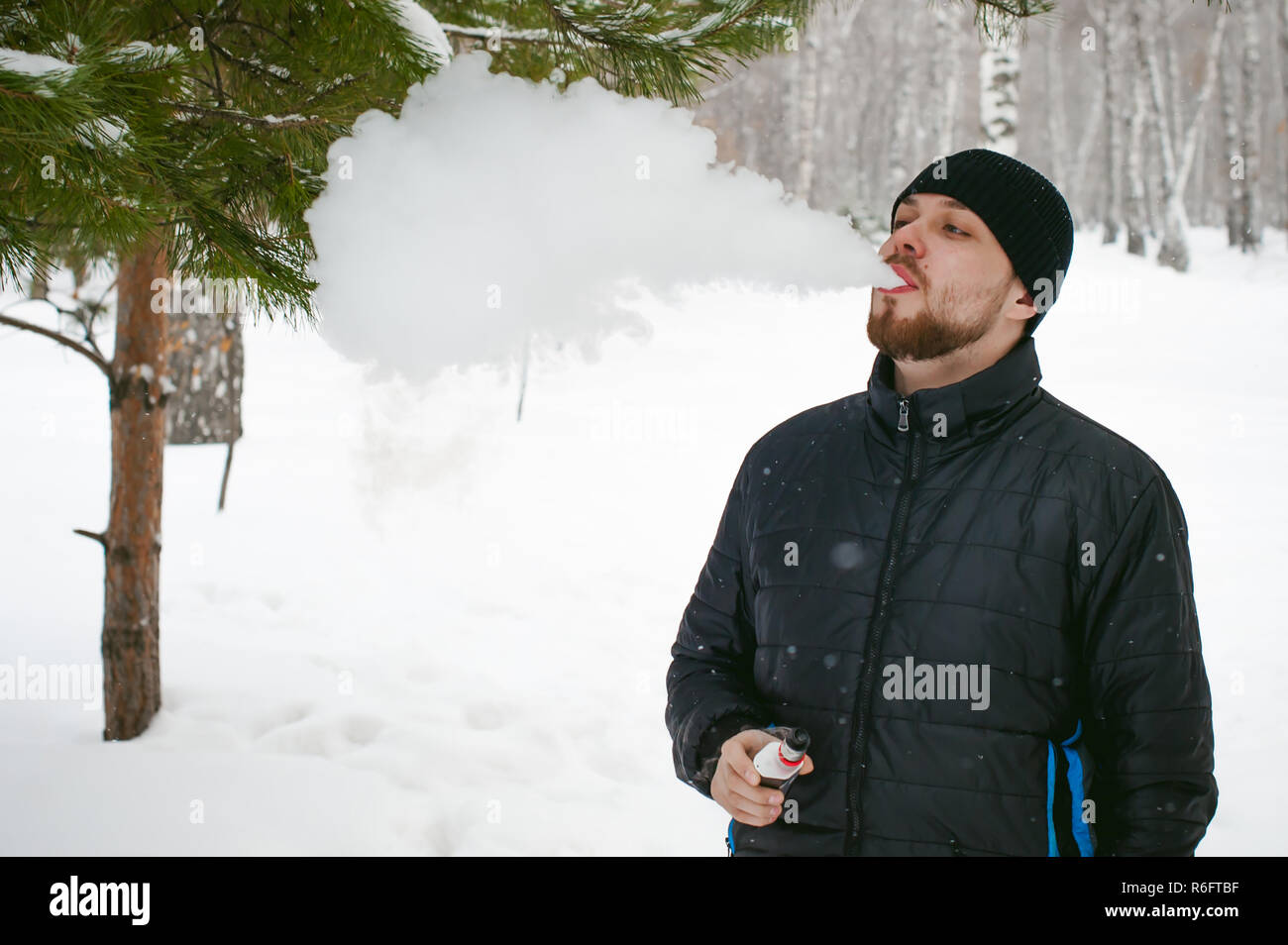Cigarette winter snow hi-res stock photography and images - Alamy
