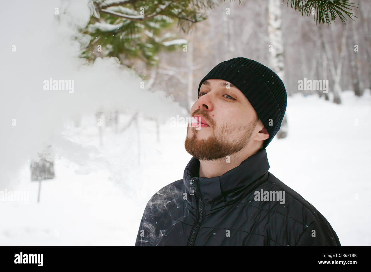 Cigarette winter snow hi-res stock photography and images - Alamy