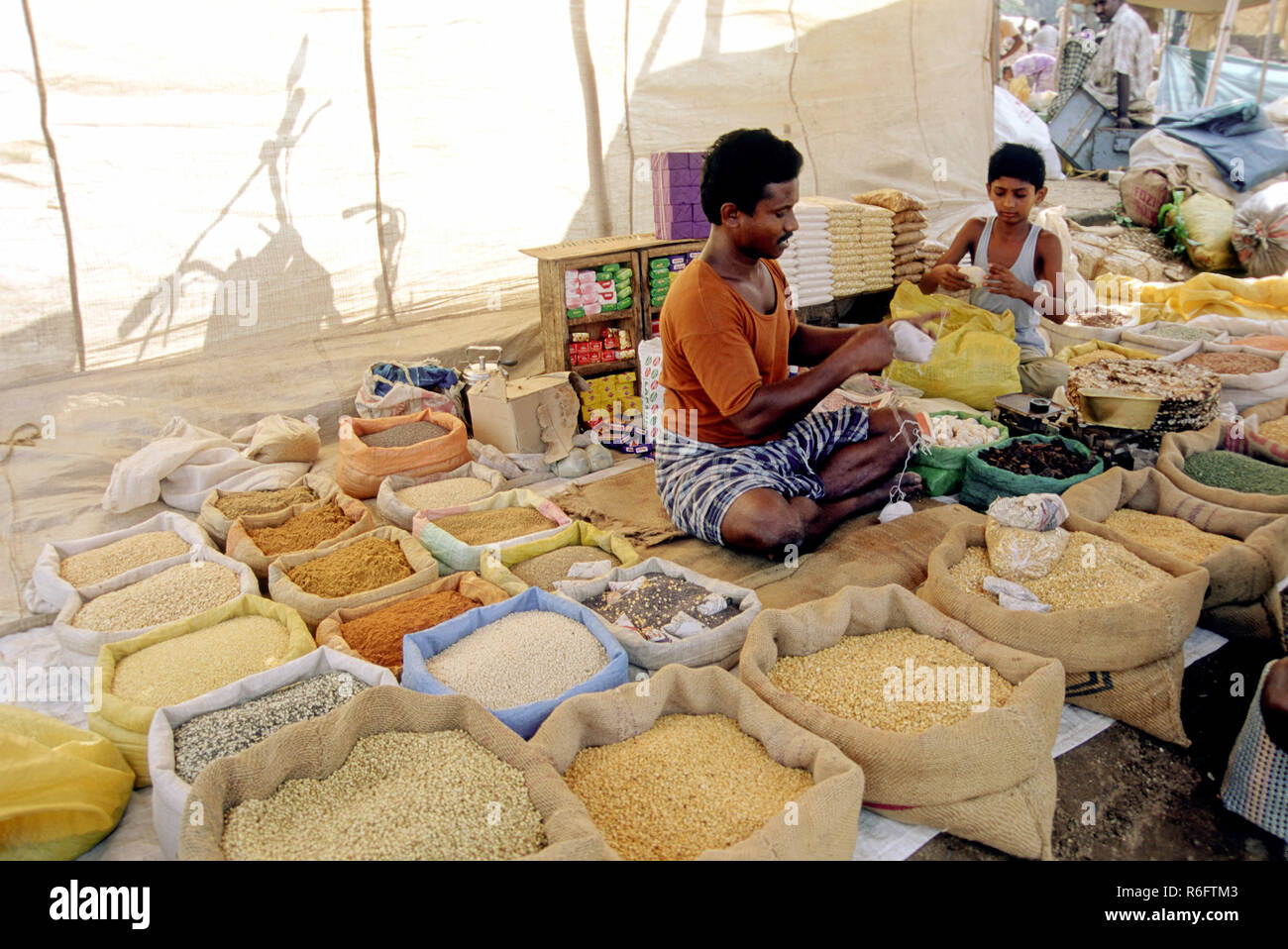 Indian rural grain vendor India Stock Photo - Alamy