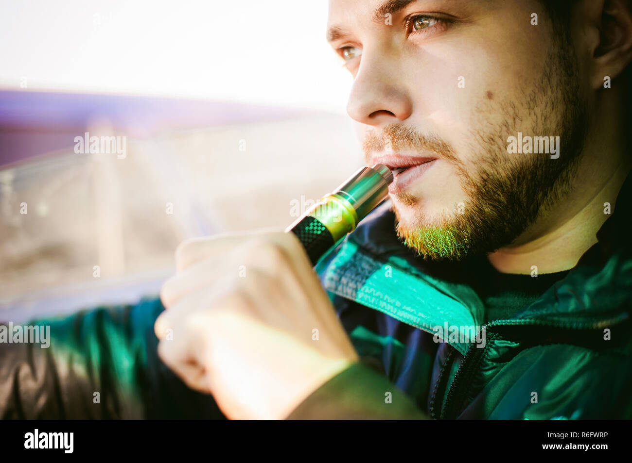 Portrait young man blowing lips hi-res stock photography and images - Alamy