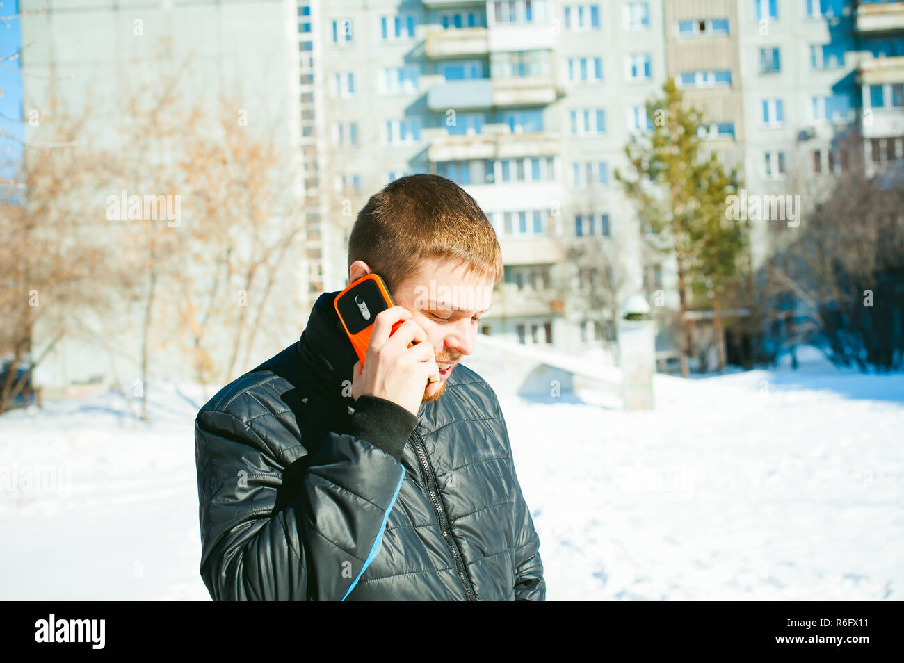 Telephone calls men. The guy is talking on cell phone in street in ...