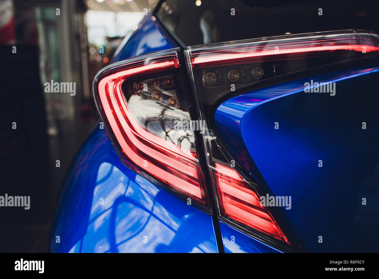 Detail on rear light blue car Stock Photo - Alamy