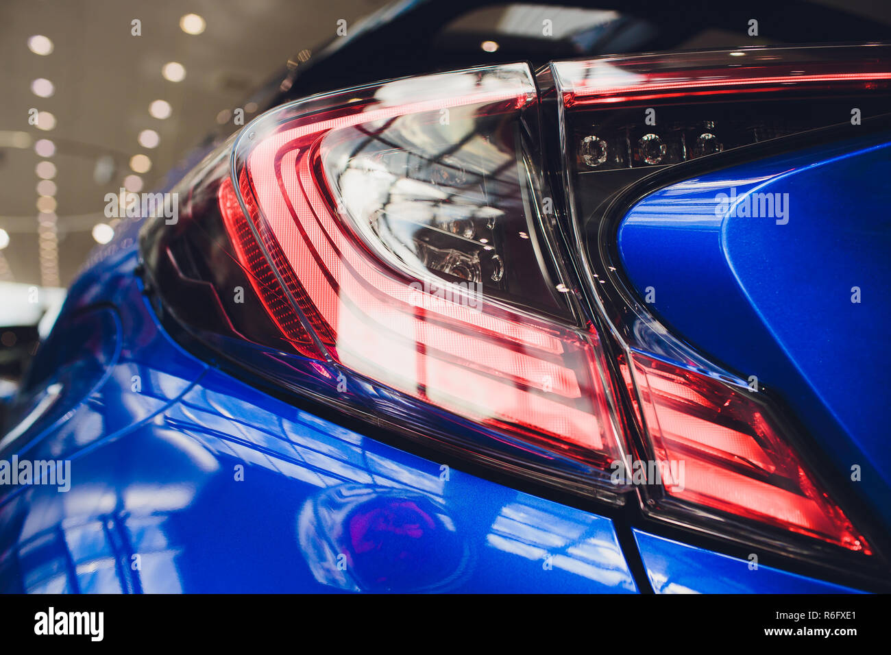 Detail on rear light blue car Stock Photo - Alamy