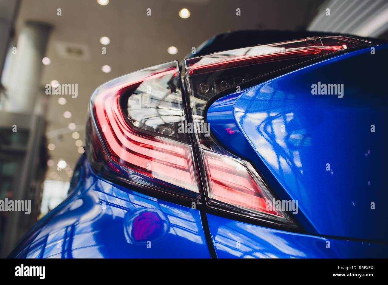 Detail on rear light blue car Stock Photo - Alamy