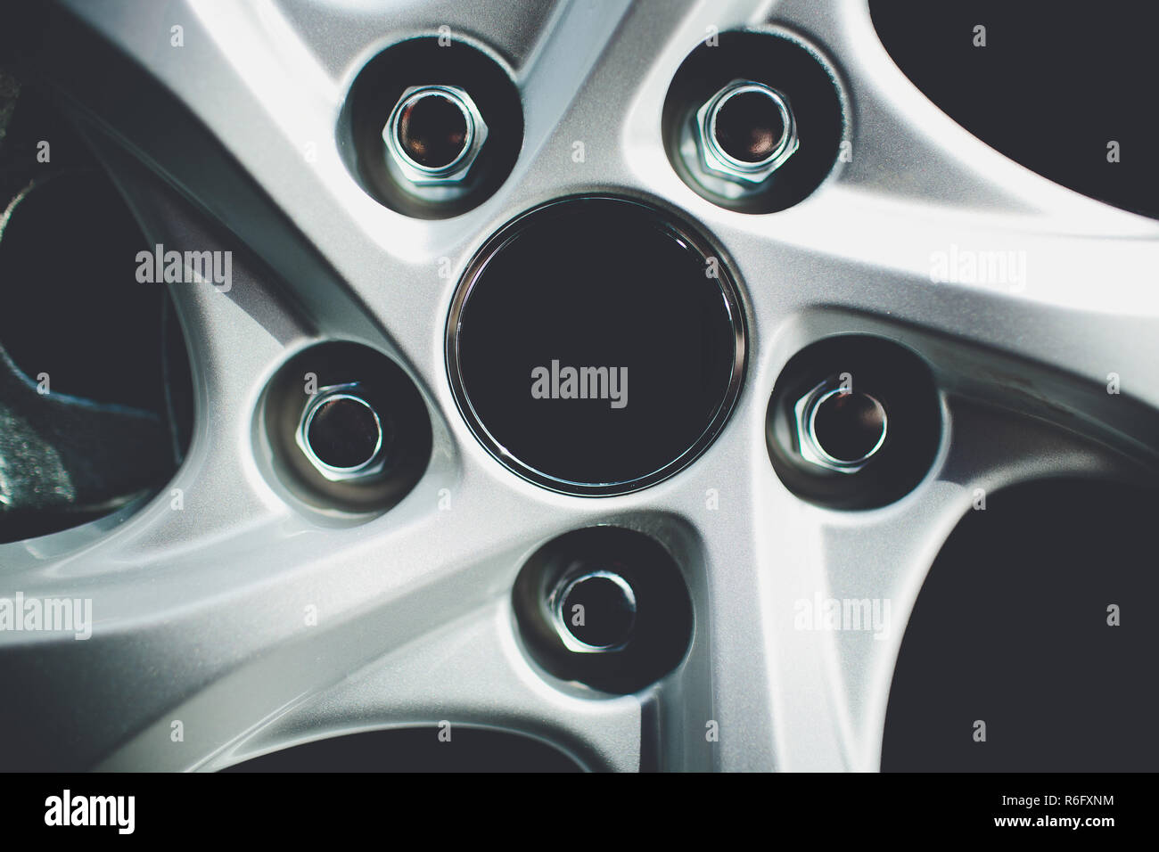 Modern automotive wheel on light alloy disc Stock Photo - Alamy