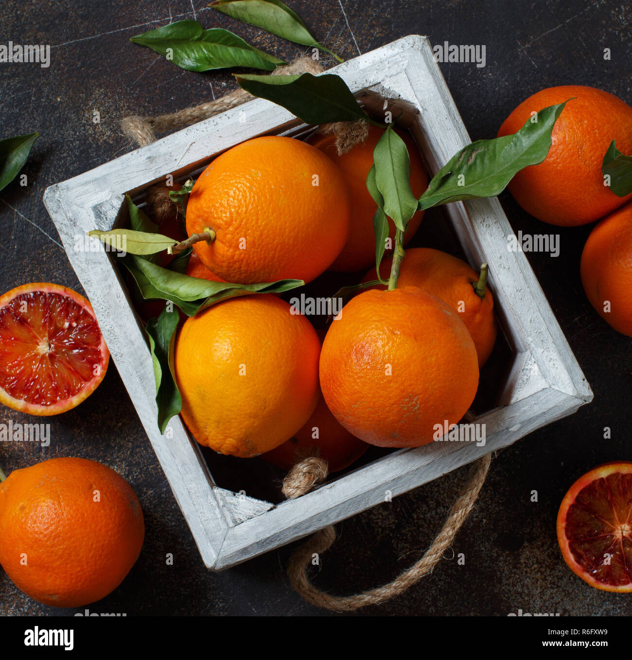 Fresh bloody oranges with leaves Stock Photo - Alamy