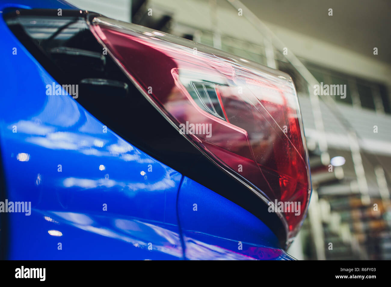 Detail on rear light blue car Stock Photo - Alamy