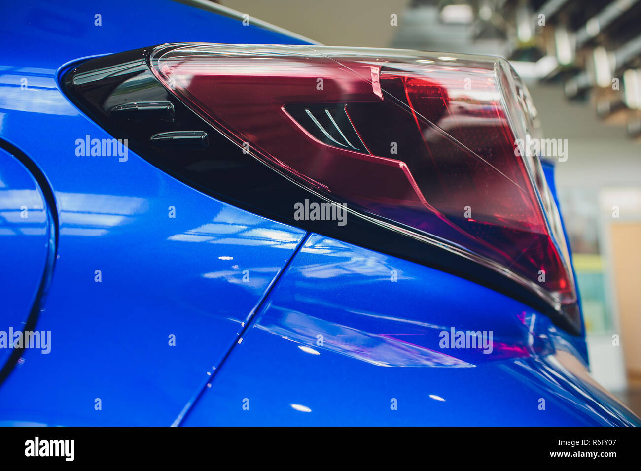 Detail on rear light blue car Stock Photo - Alamy