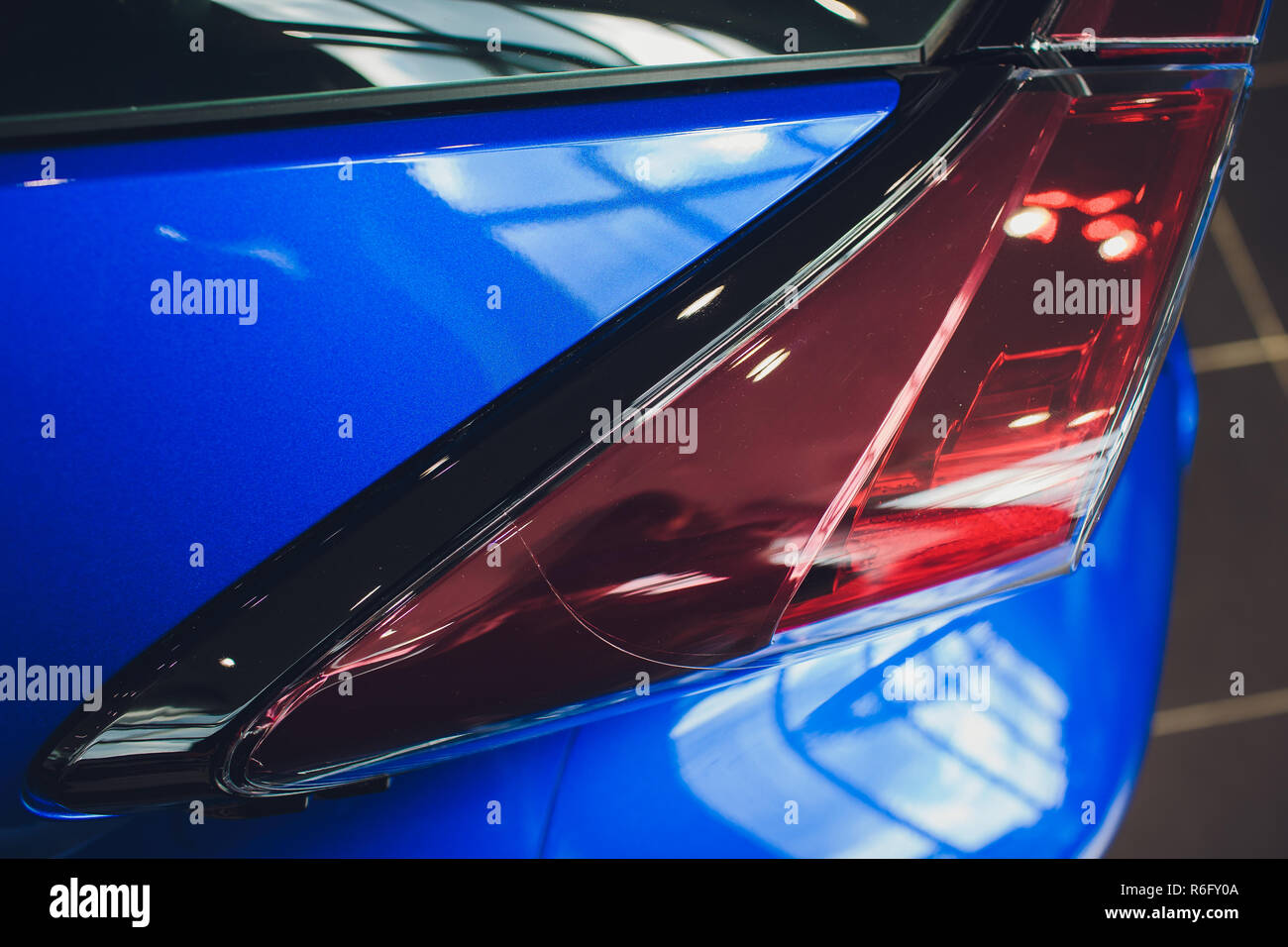 Detail on rear light blue car Stock Photo - Alamy