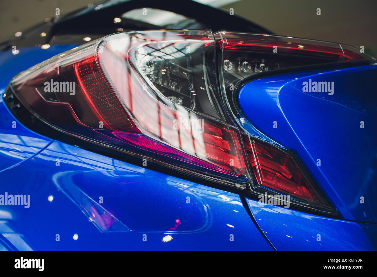 Detail on rear light blue car Stock Photo - Alamy