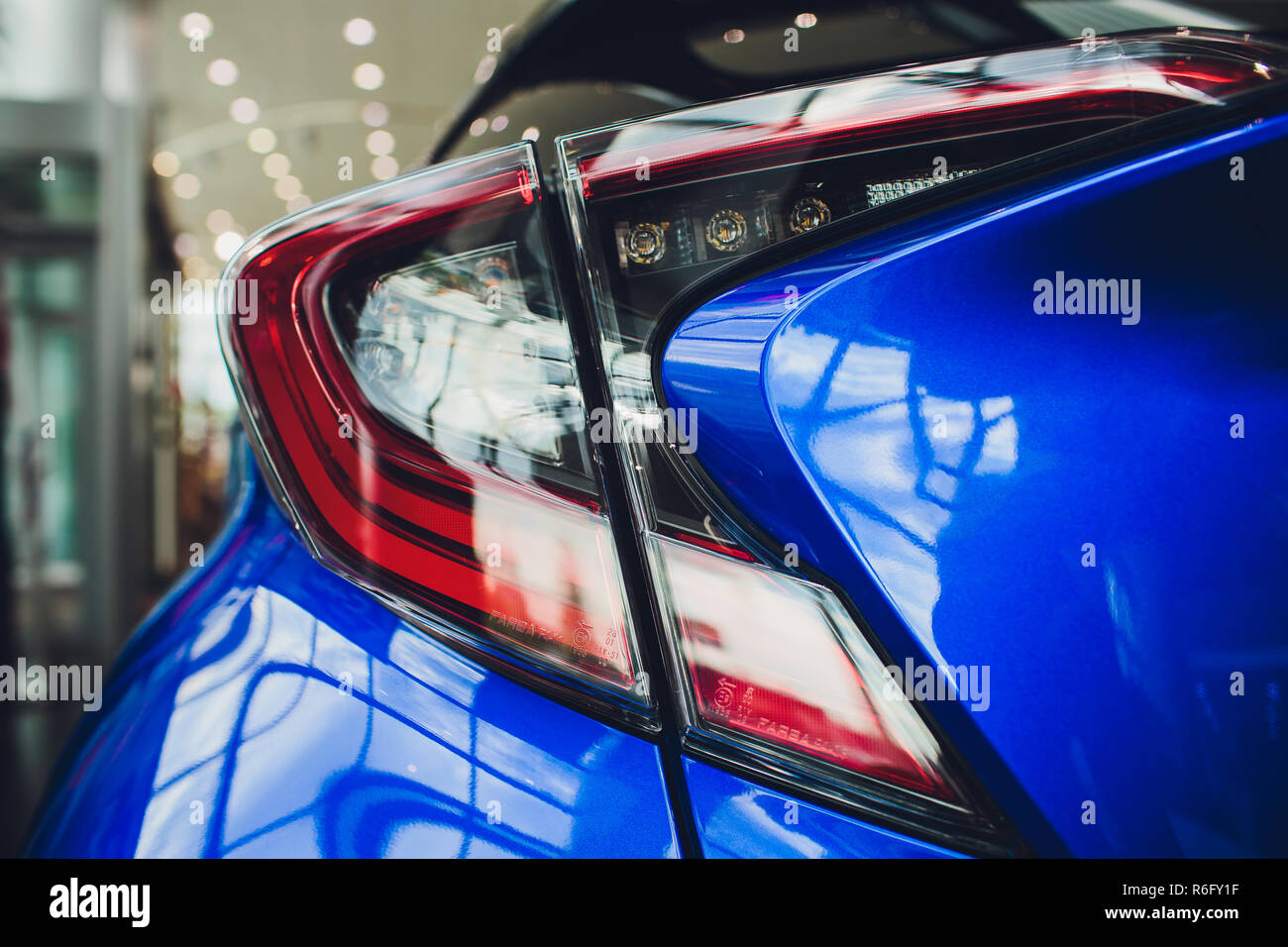 Detail on rear light blue car Stock Photo - Alamy