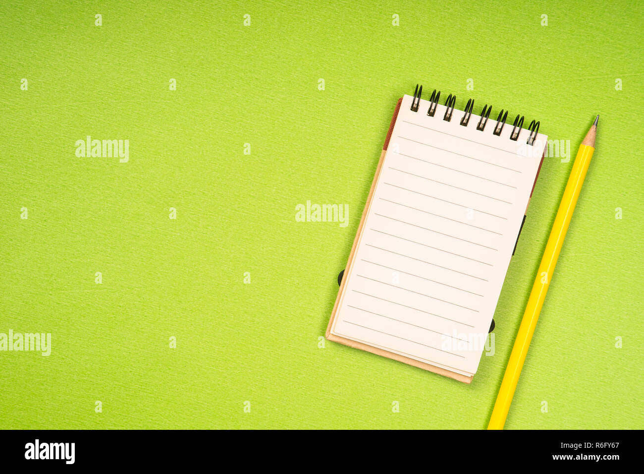 notepad with pencil Stock Photo - Alamy