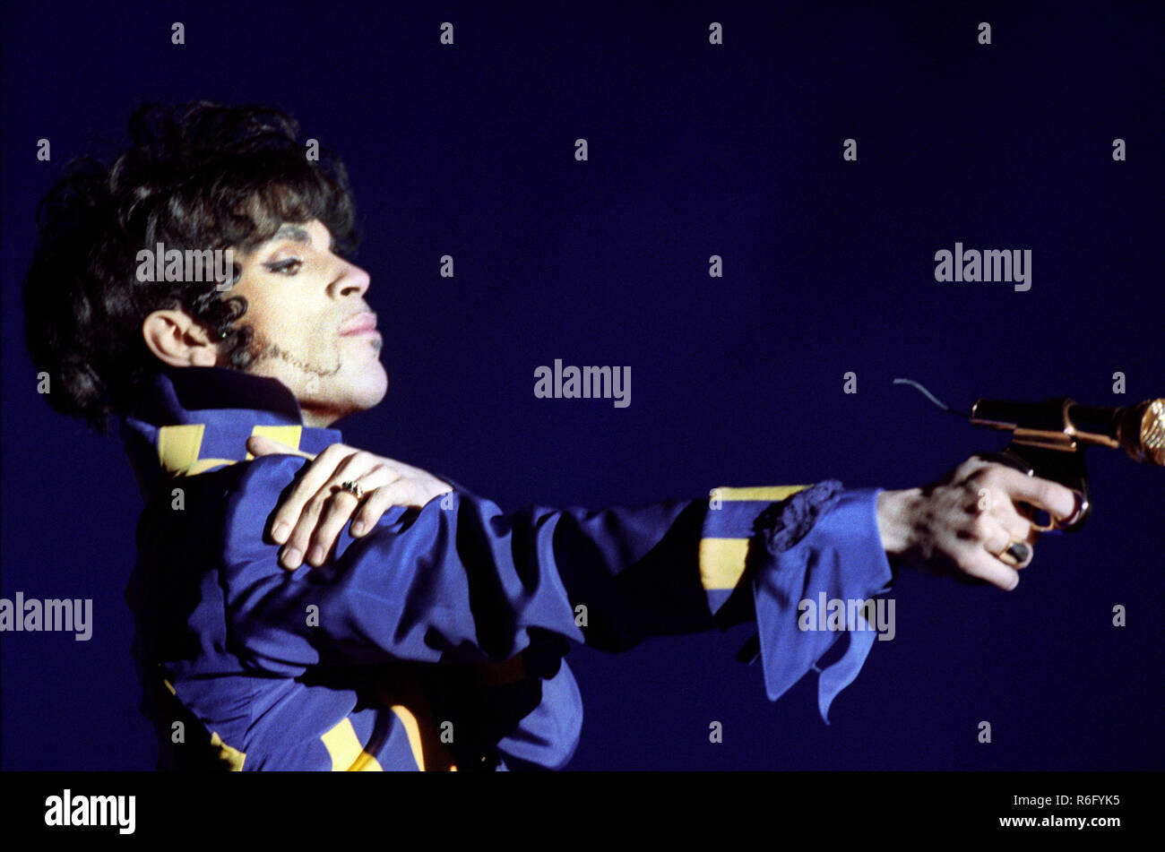 US pop star Prince used a microphone in the form of a pistol at the ...