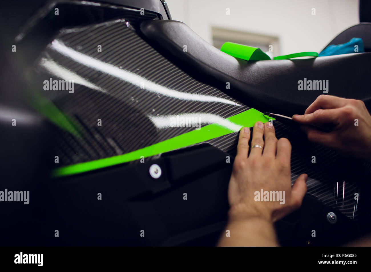 Car ATV wrapping specialists wrapping vehicle with green vinyl film or ...