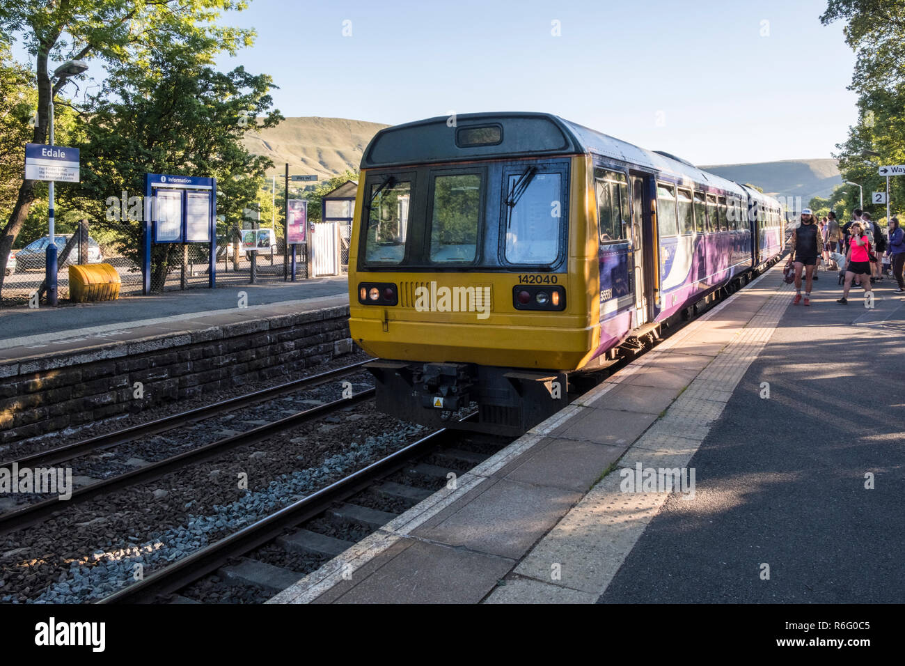 Northern train arriving at Edale Railway Station on a Summer evening ...