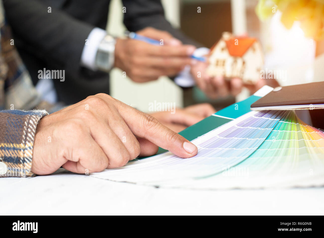 The architect will discuss how the color of the house will be selected ...