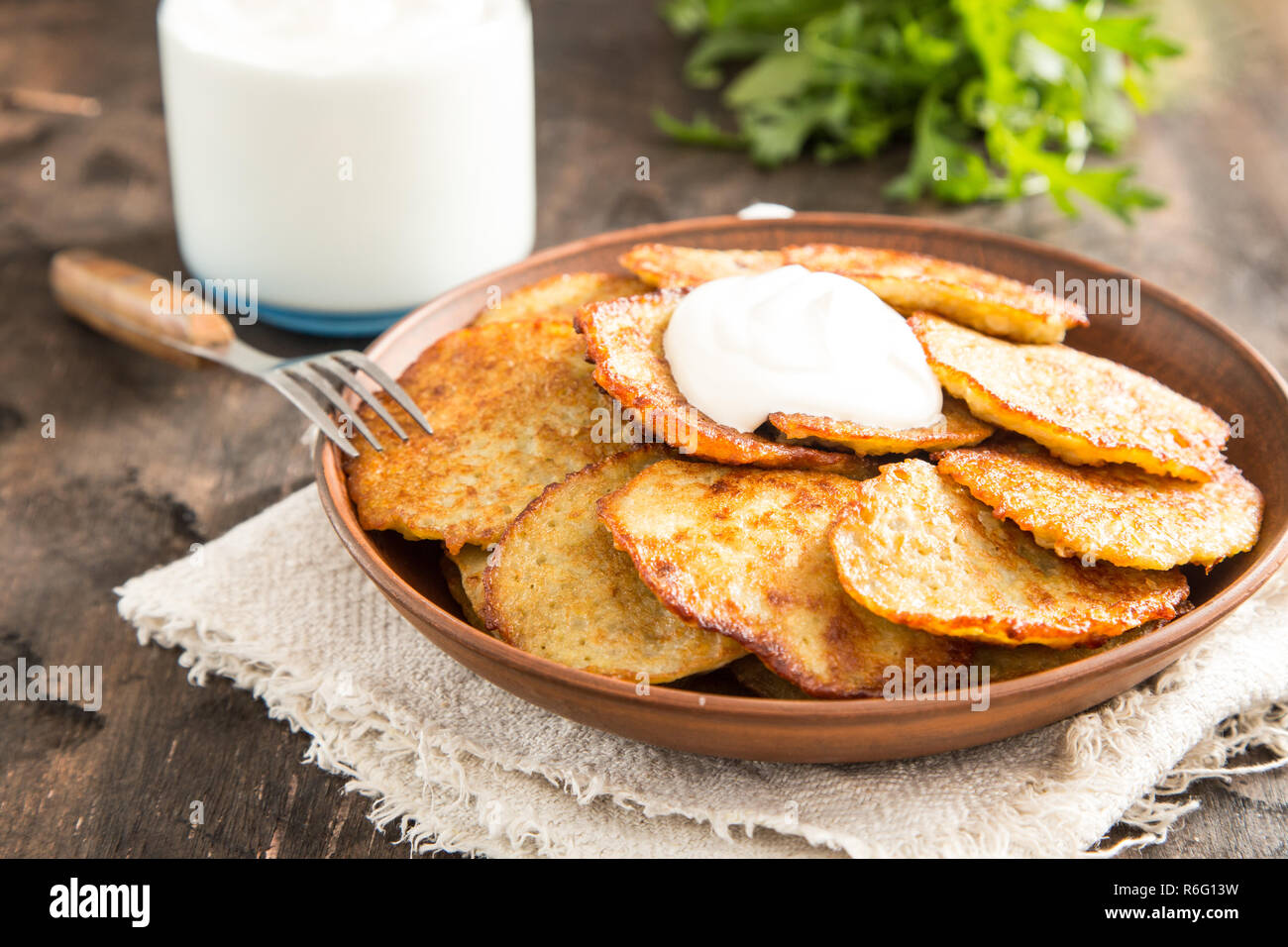 Draniki - potato fritters. potato pancakes. The naitonal dish of ...