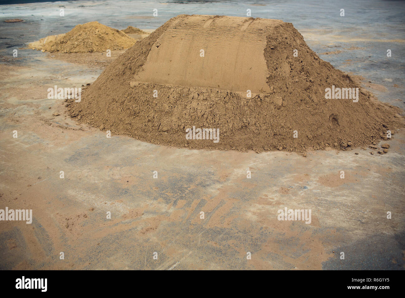 stack of sand. Pile yellow sand. Construction sand Stock Photo - Alamy