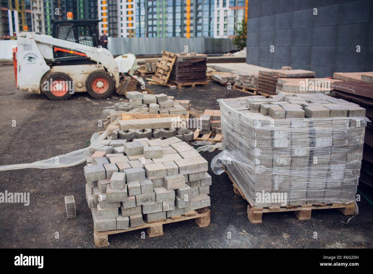 Brick for building in construction site Stock Photo - Alamy