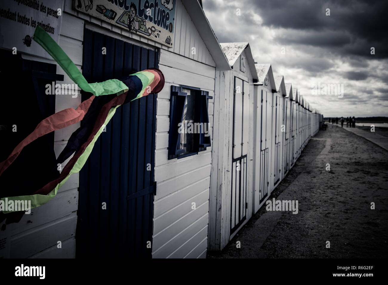 Beach huts on a windy day Stock Photo - Alamy