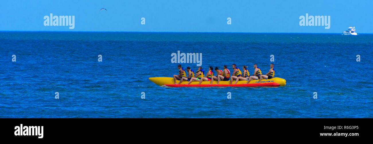 Odessa, Ukraine - August 8, 2018. Tourists having fun and enjoy riding ...