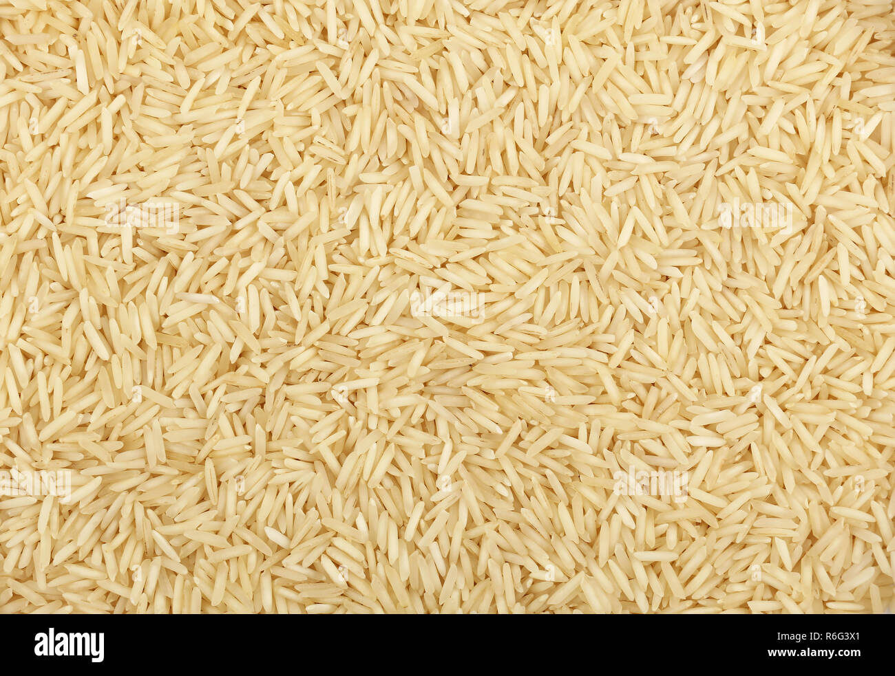 White Indian Basmati rice close up background Stock Photo - Alamy