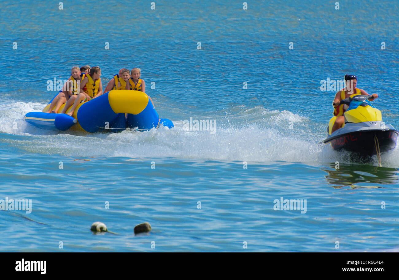 Odessa, Ukraine - August 8, 2018. Tourists having fun and enjoy riding ...