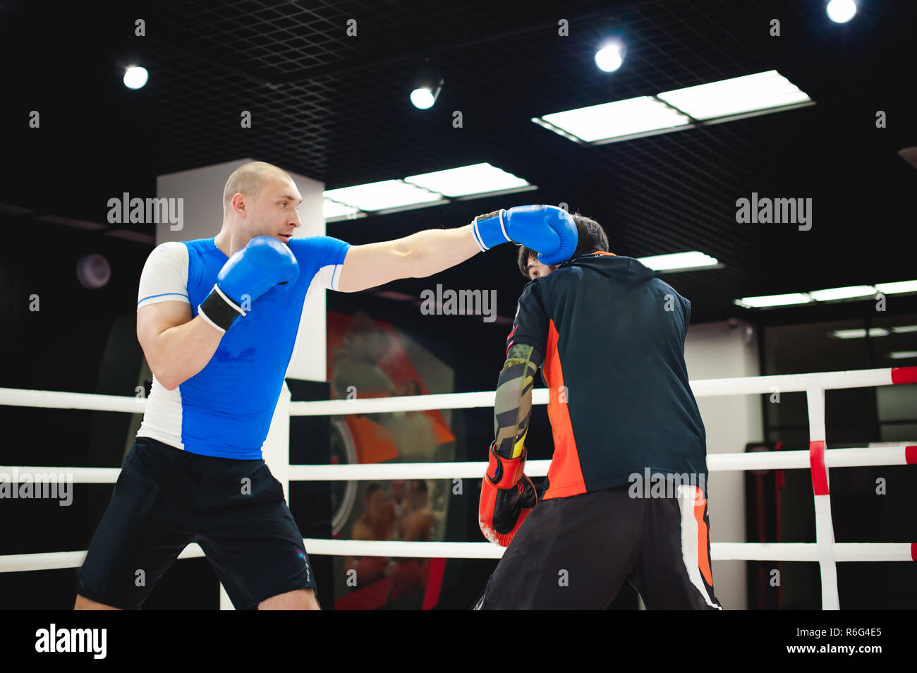 Professional Muay Thai fighter. Male boxer in training sportswear, an ...