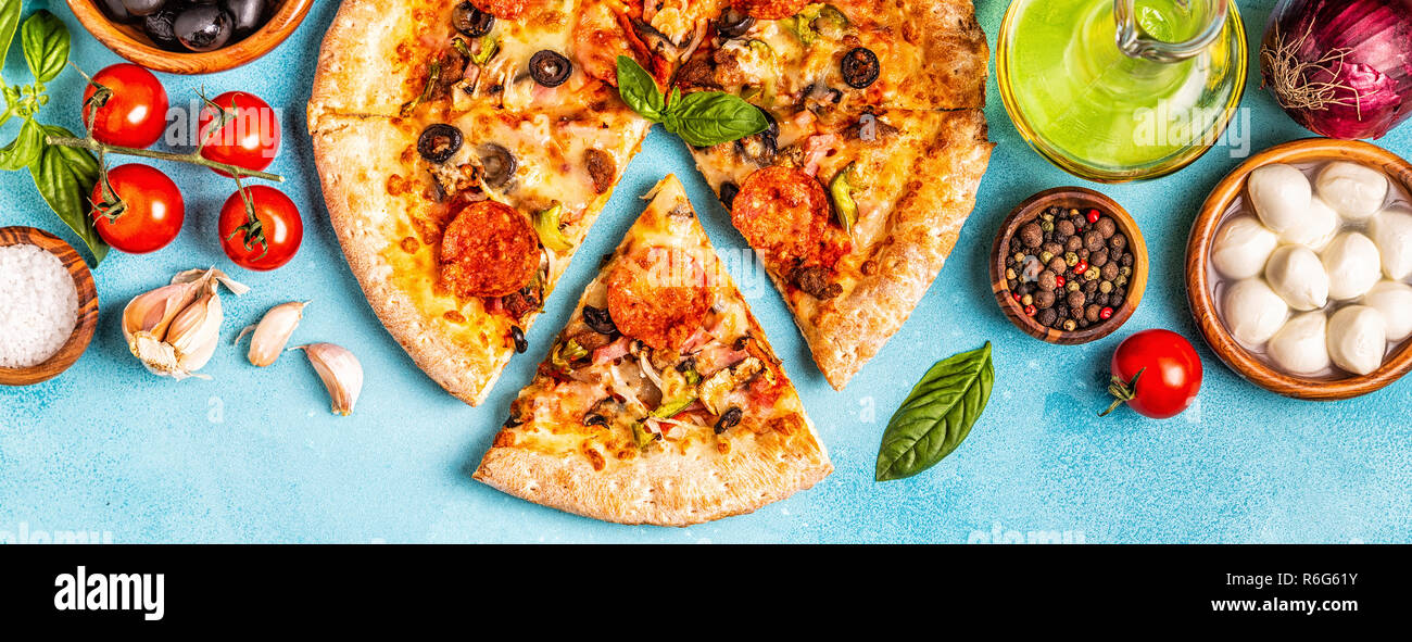 Meat pizza with ingredients, top view Stock Photo - Alamy