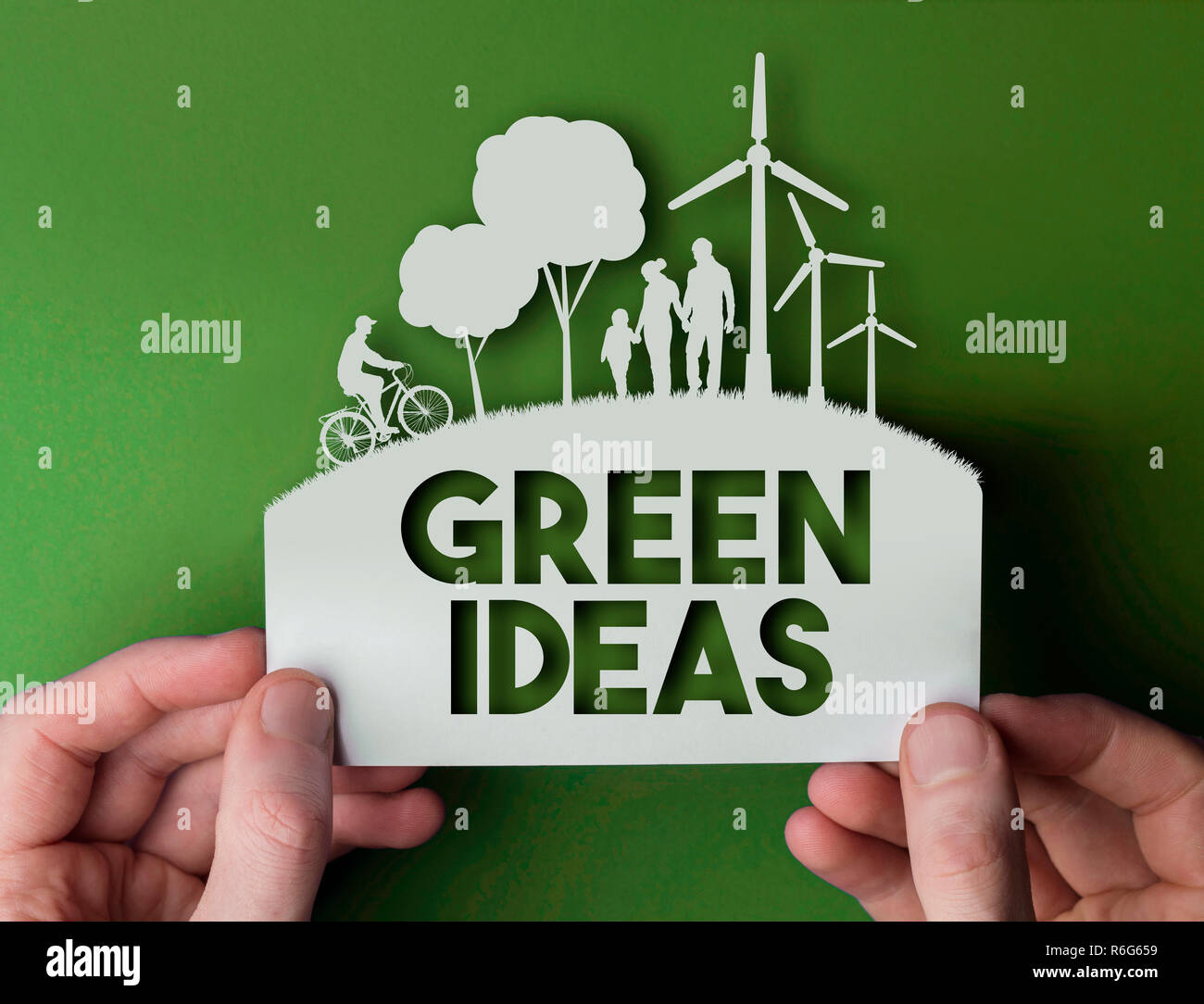 Green Ideas - green environmental paper background with wind turbines ...