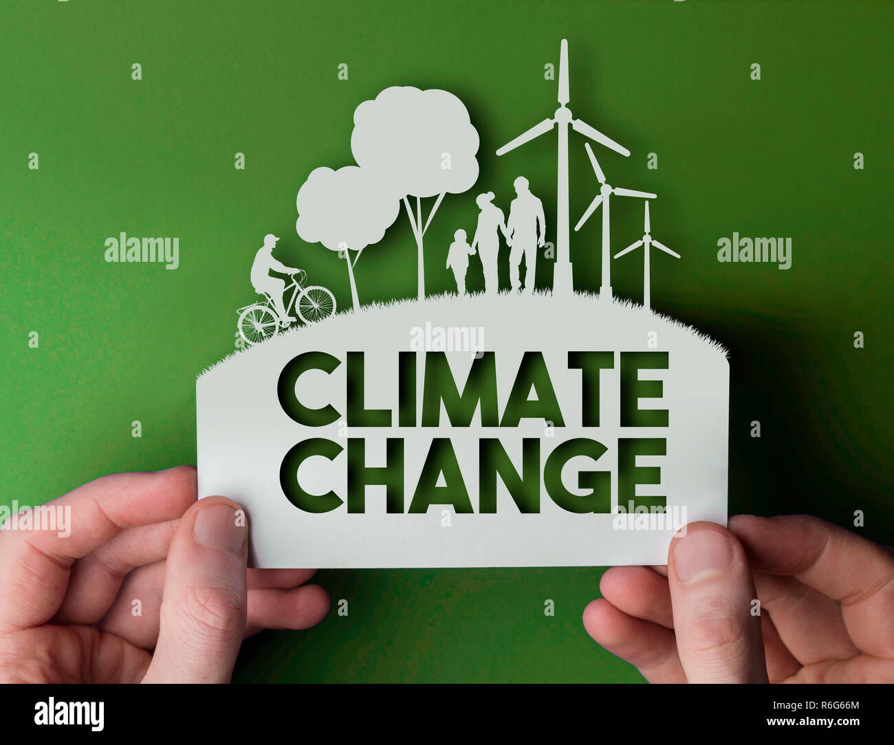 Climate change - green environmental paper background with wind ...