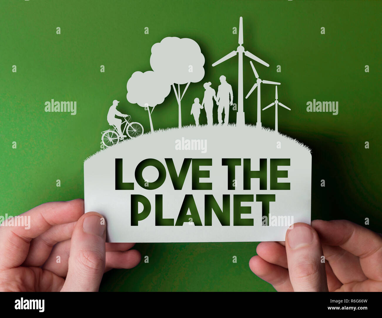 Love the planet - green environmental paper background with wind ...
