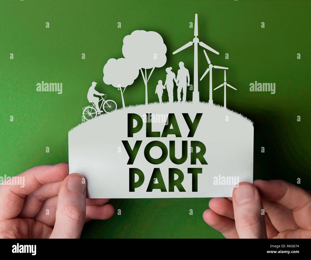 Play your part - green environmental paper background with wind ...