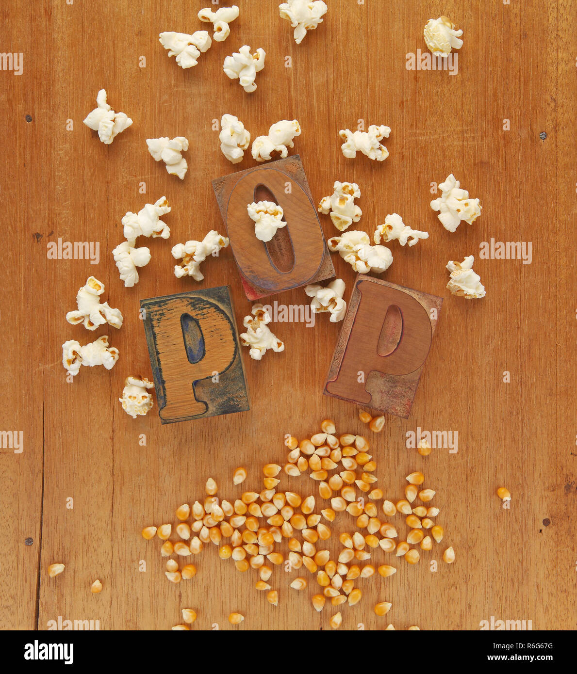 Popped and unpopped corn Stock Photo - Alamy