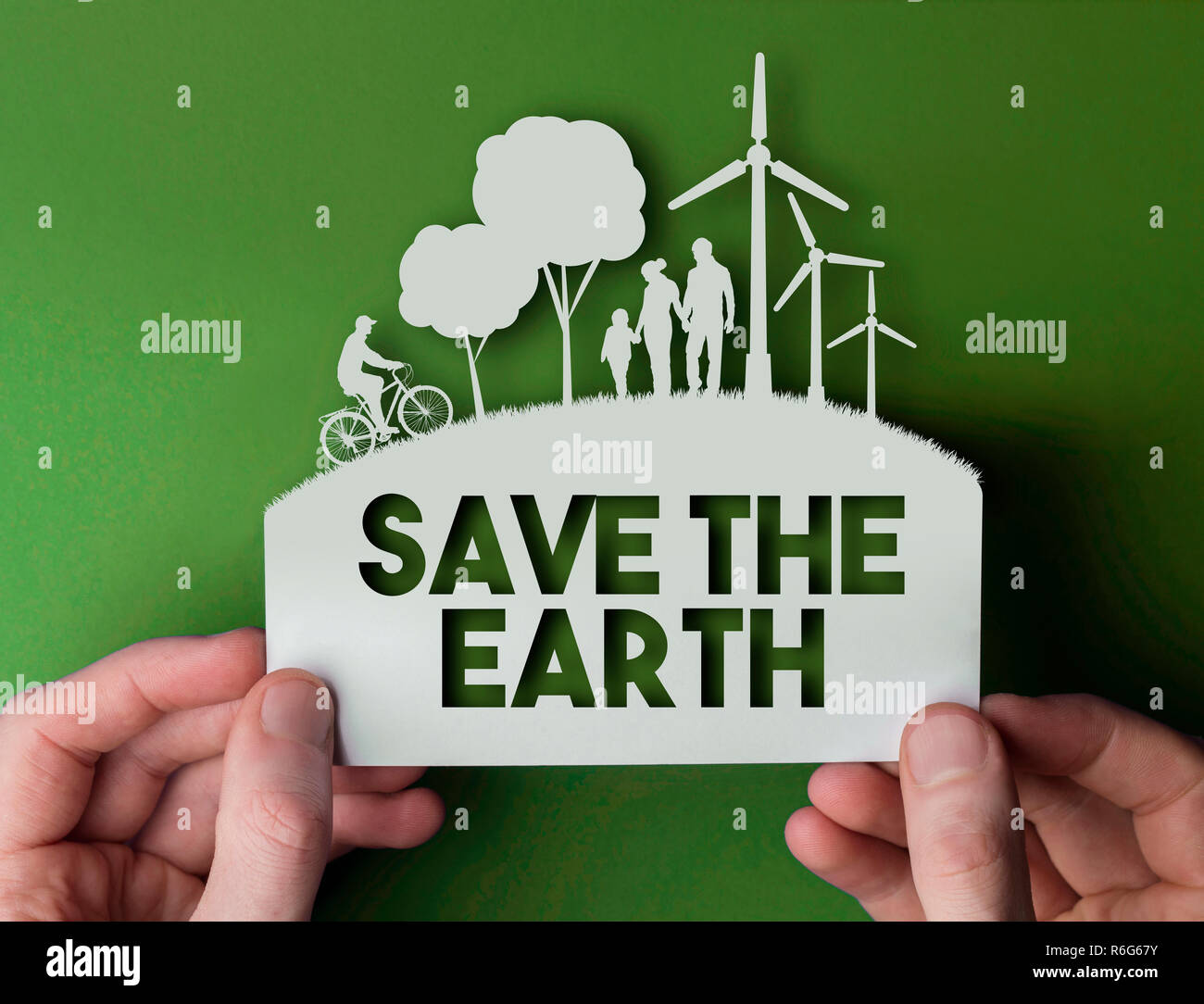Save the earth - green environmental paper background with wind ...