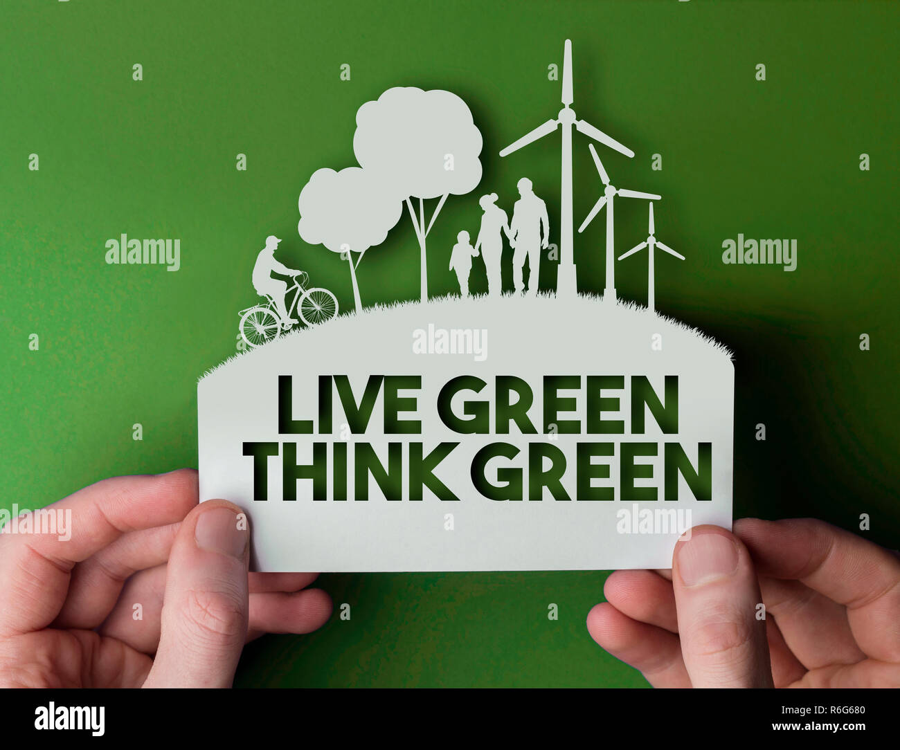 Live green Think Green - green environmental paper background with wind ...