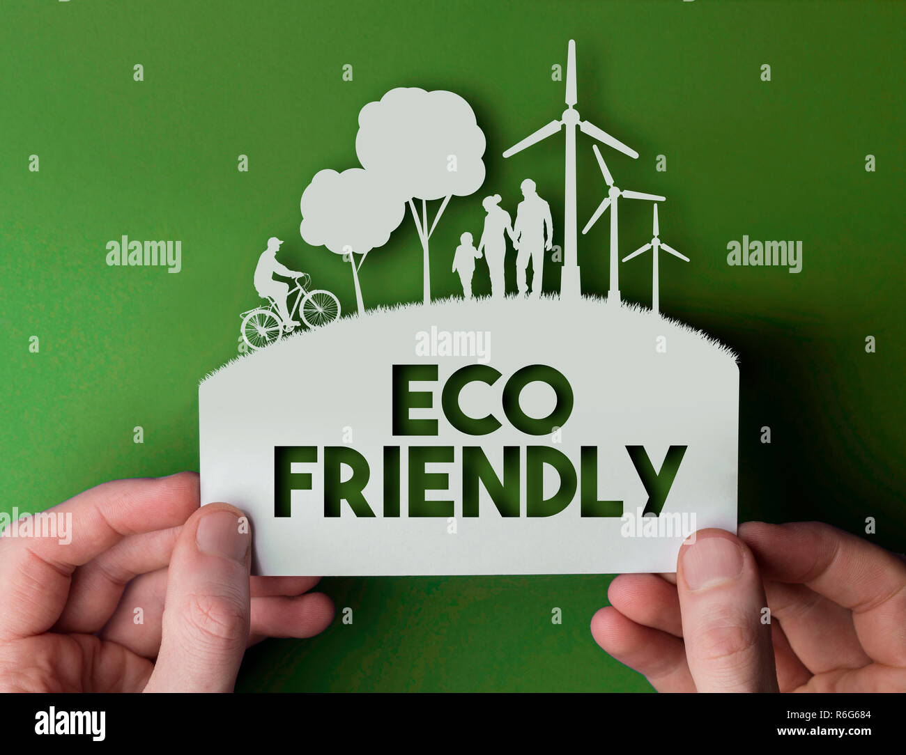 Eco Friendly - green environmental paper background with wind turbines ...
